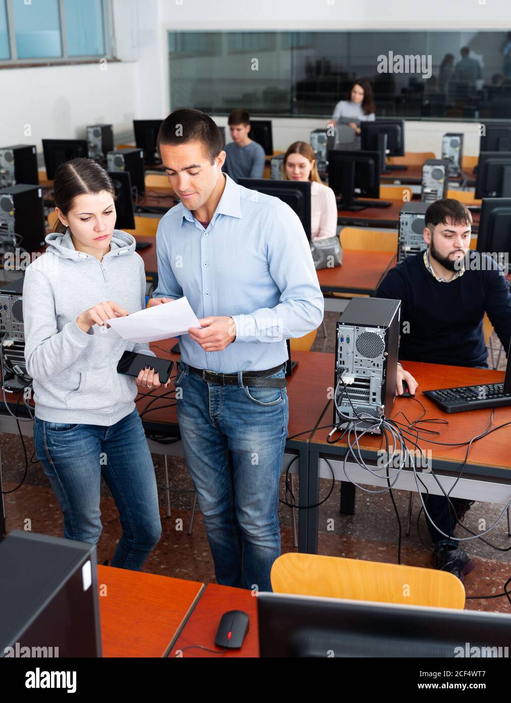Student submits for verification the work done at computer class Stock ...