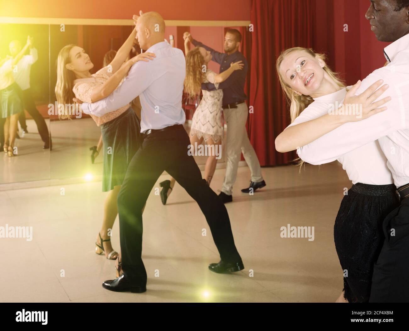 Group young dancers in flowing hi-res stock photography and images - Alamy