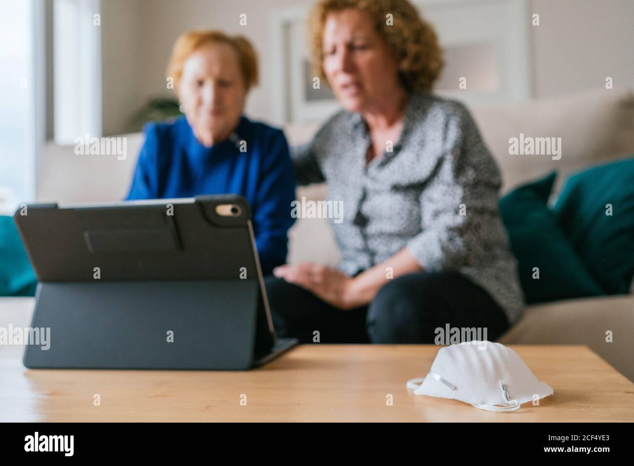 Women having video conversation on laptop at home Stock Photo - Alamy