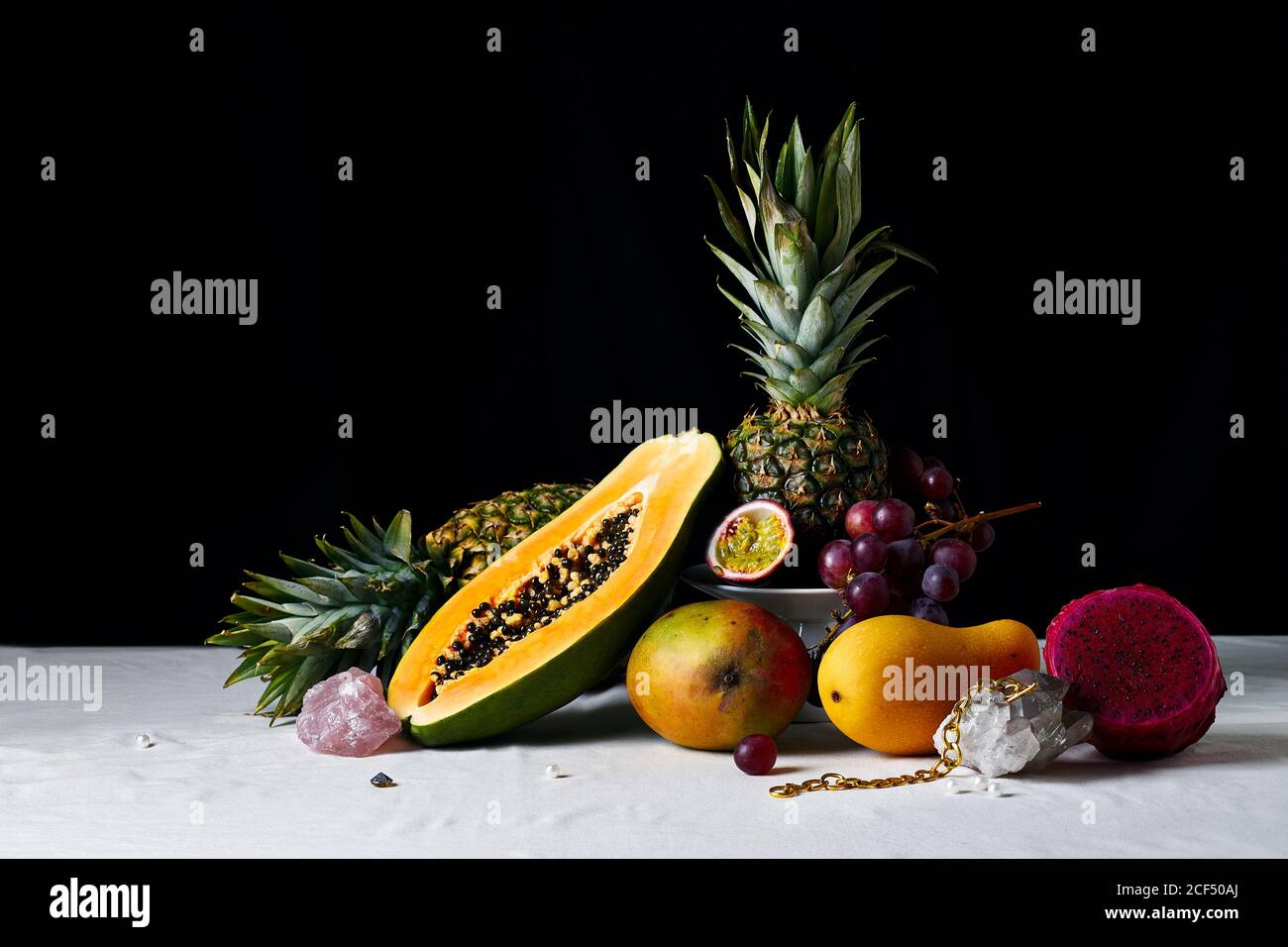 Still life with tropical fruits, gems and various objects Stock Photo ...