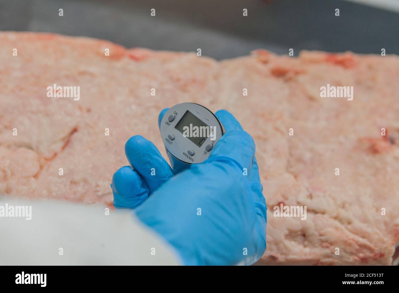 From above sensor screen of digital device measuring meat quality ...