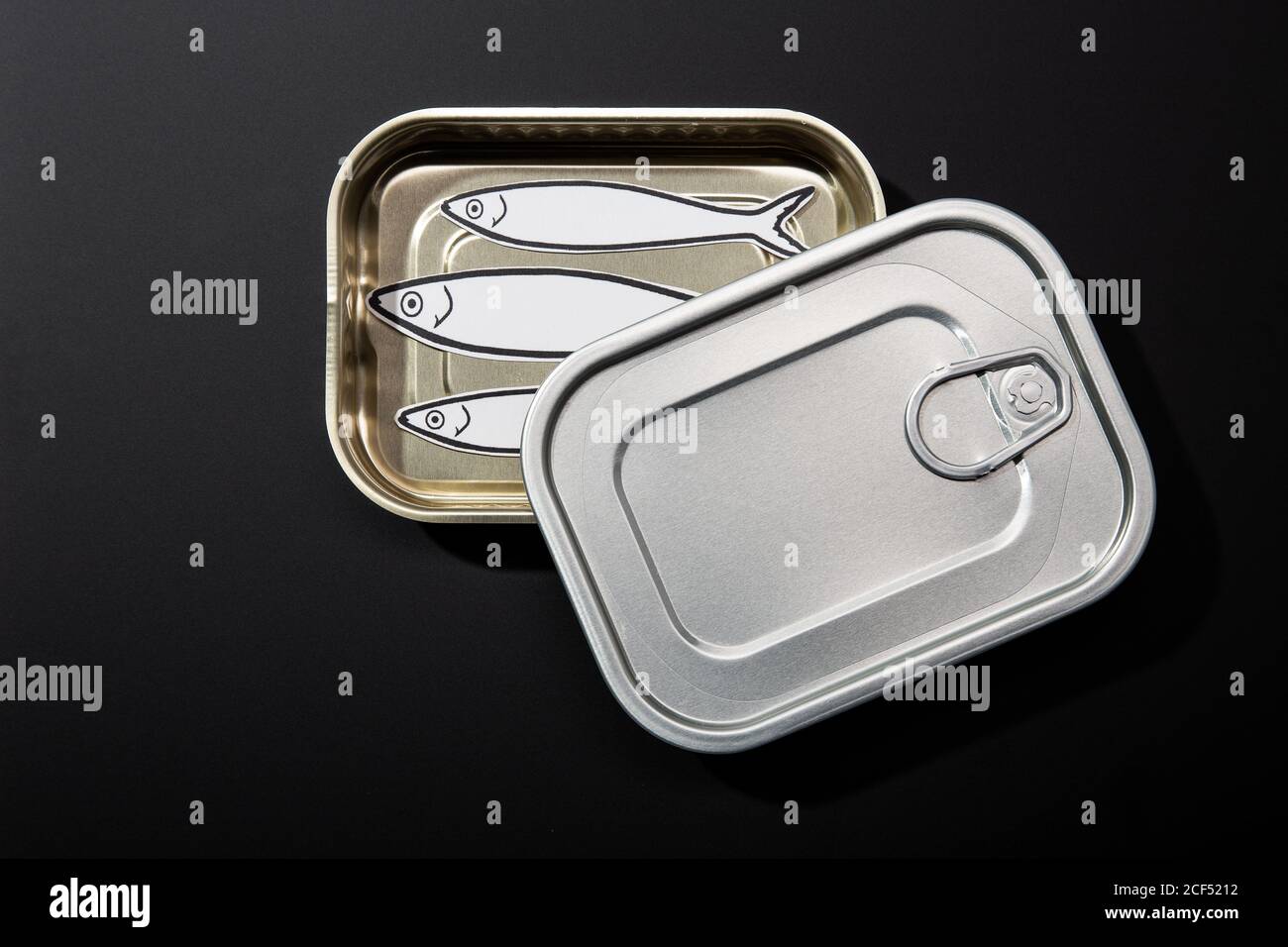 From above example of open tin can isolated on black background with ...