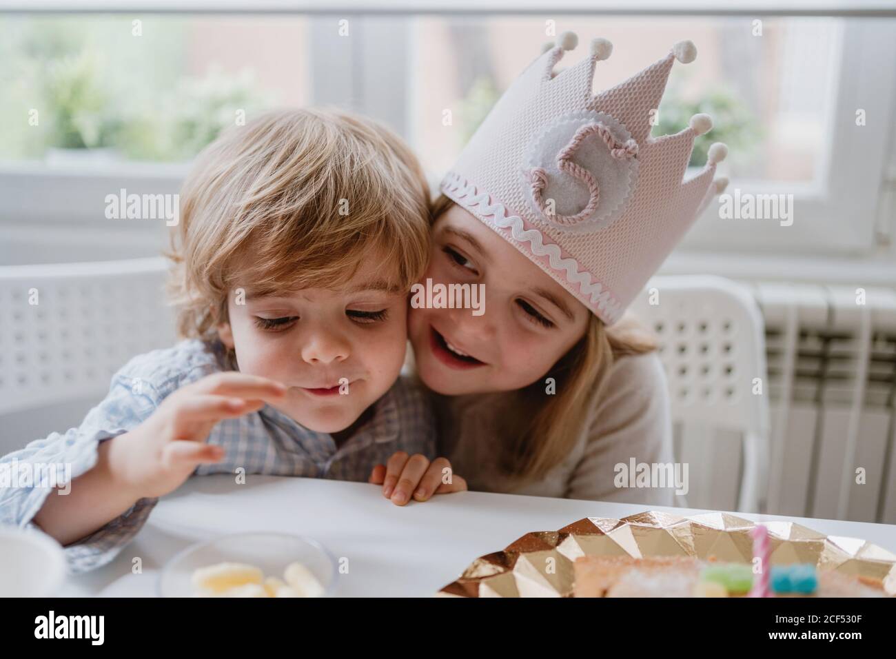 Happy brothers celebrating birthdays at home Stock Photo - Alamy