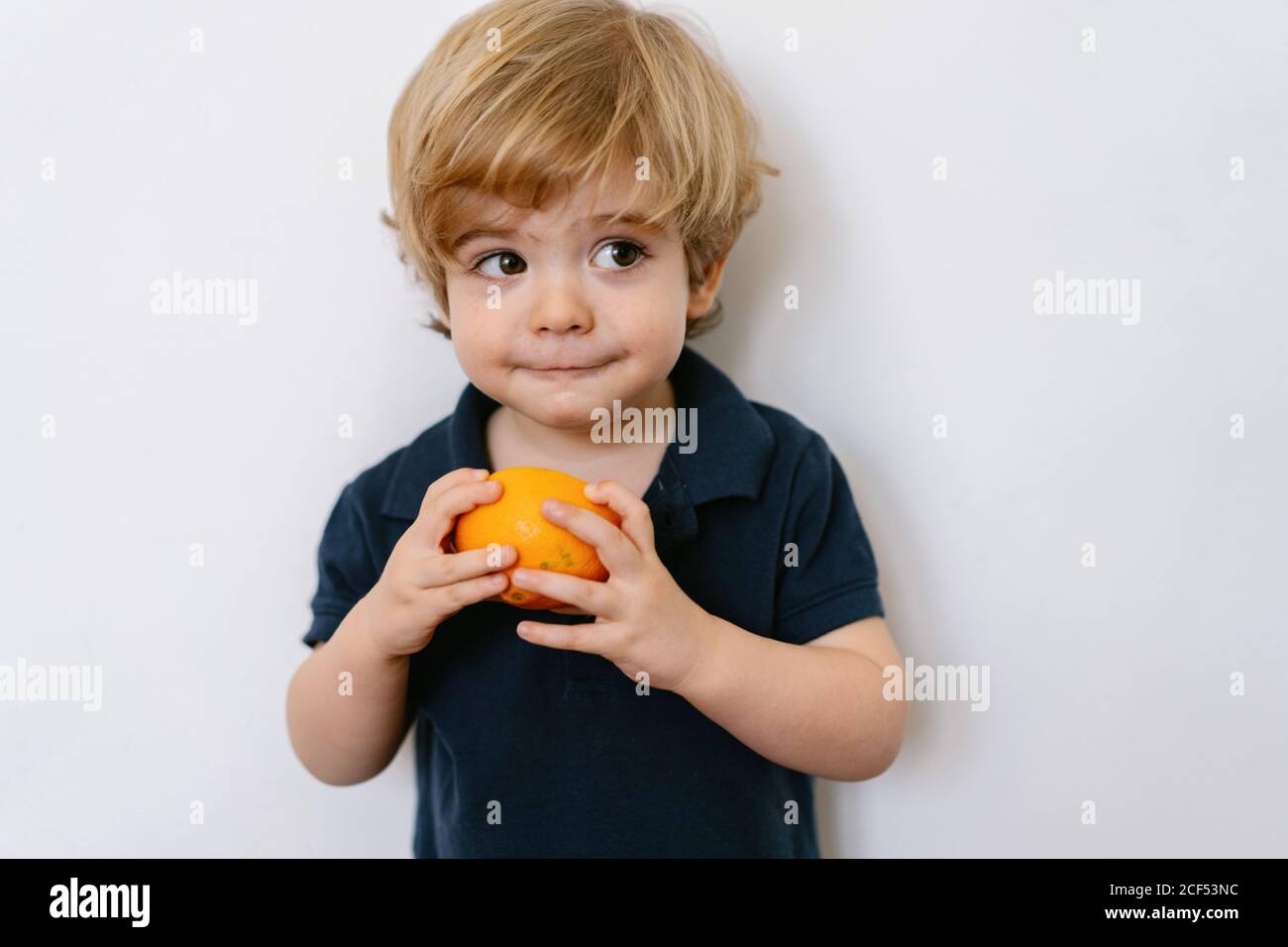 Child eat fruit blur hi-res stock photography and images - Alamy
