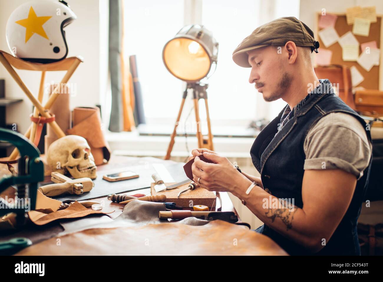portrait of muscular middle eastern mustache man wearing creative cup ...