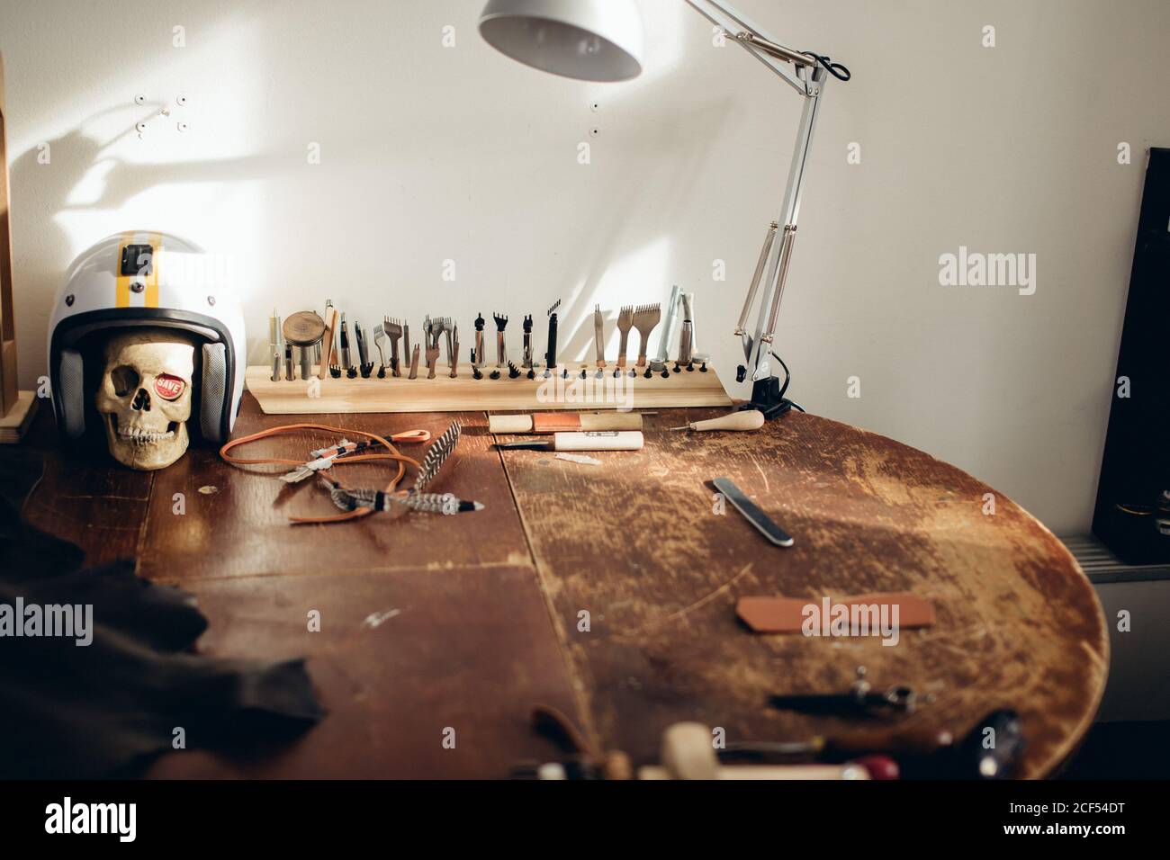 Professional crafter making leather items Stock Photo - Alamy