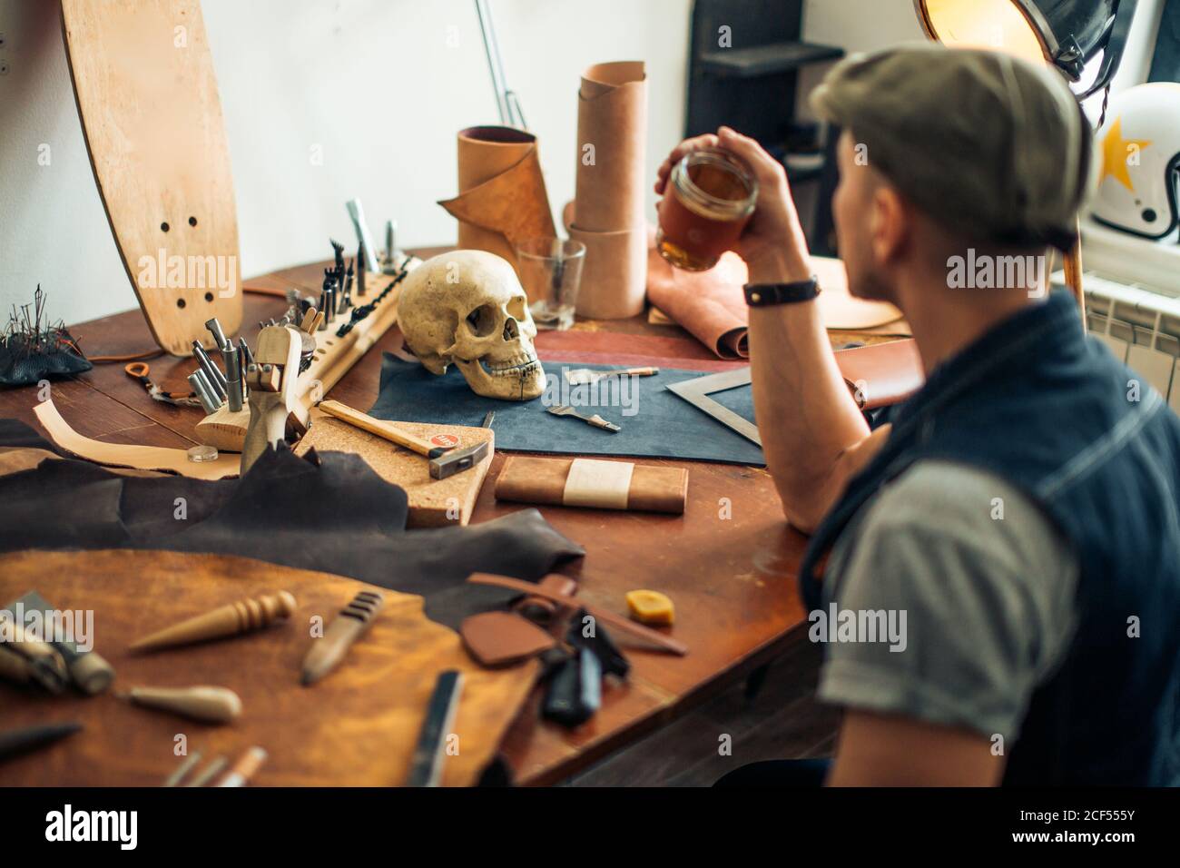 Professional crafter making leather items Stock Photo - Alamy