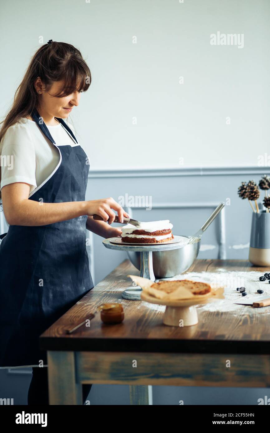 making cake in kitchen Stock Photo - Alamy