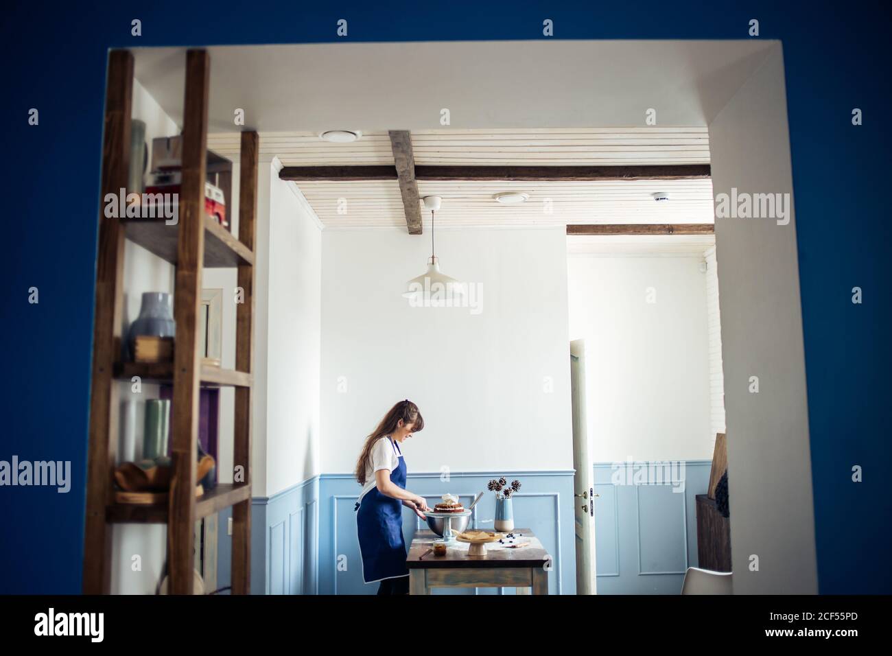 making cake in kitchen Stock Photo - Alamy