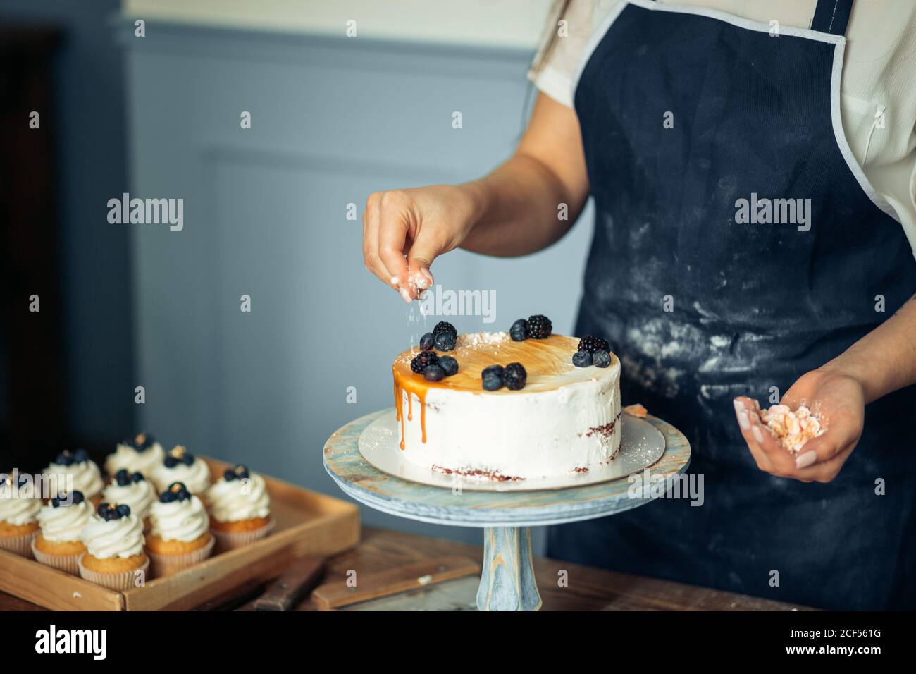 the process of decorating cupcakes Stock Photo - Alamy