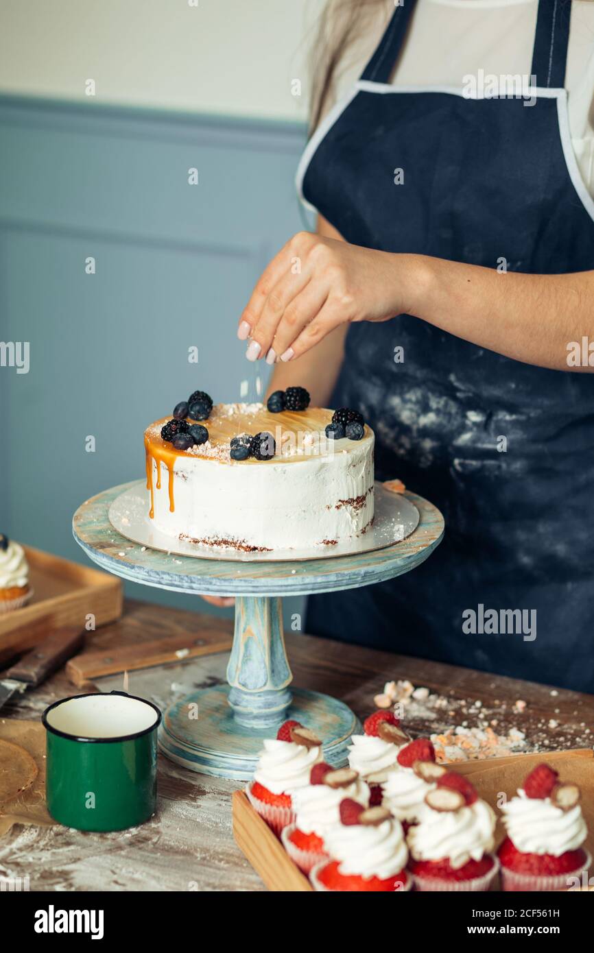 the process of decorating cupcakes Stock Photo - Alamy