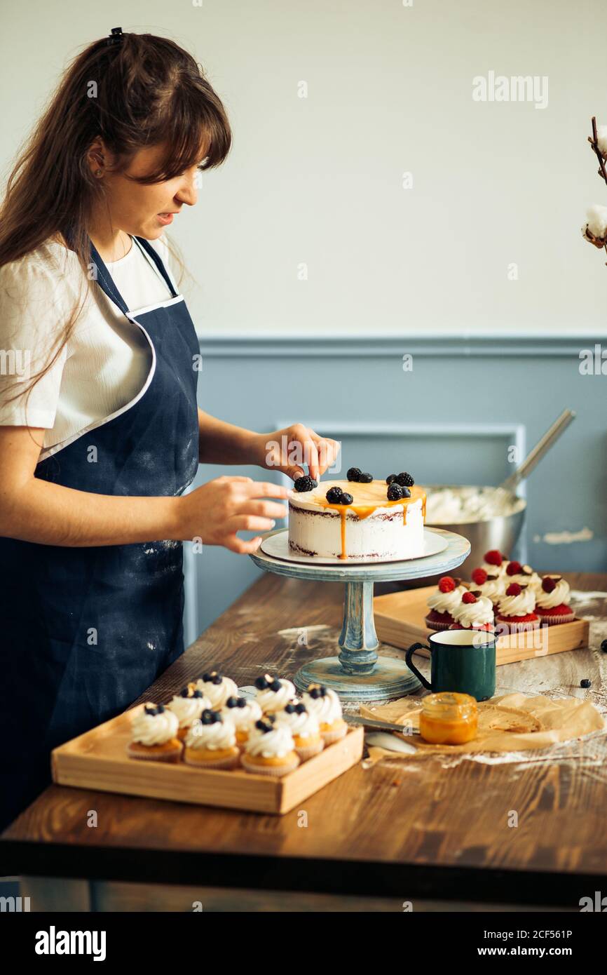 the process of decorating cupcakes Stock Photo - Alamy