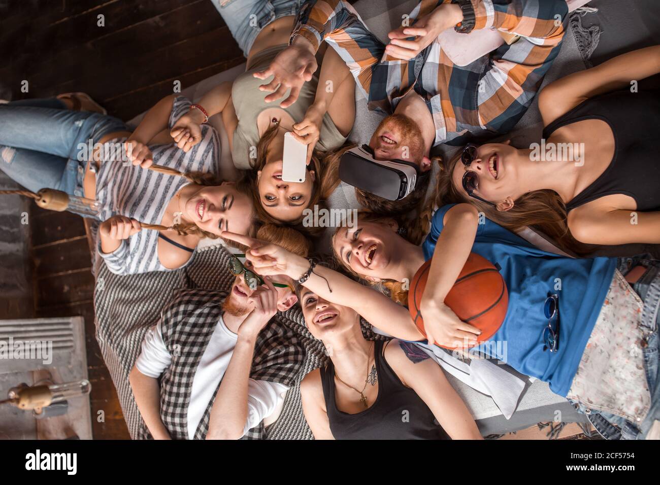 happy group of women and men faces in circle laughing and having fun ...