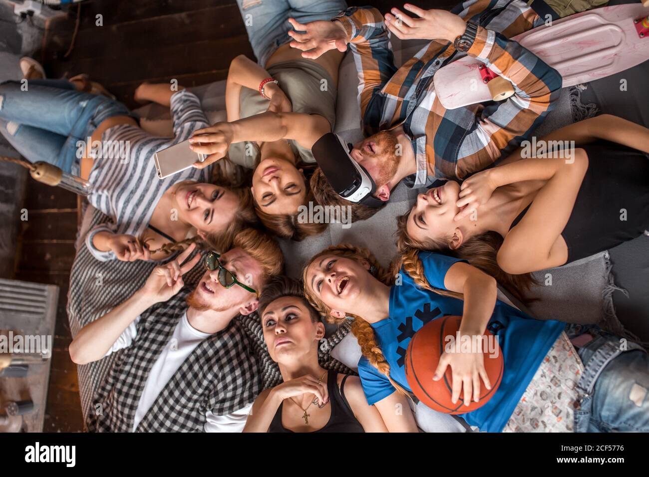 happy group of women and men faces in circle laughing and having fun ...