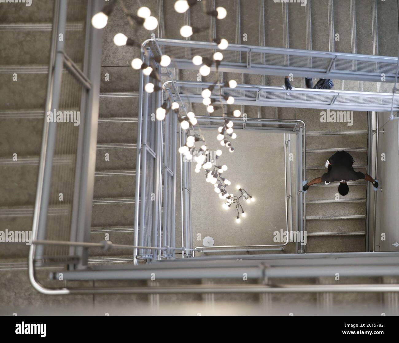 New York, United States. 03rd Sep, 2020. Workers clean the hand rails ...