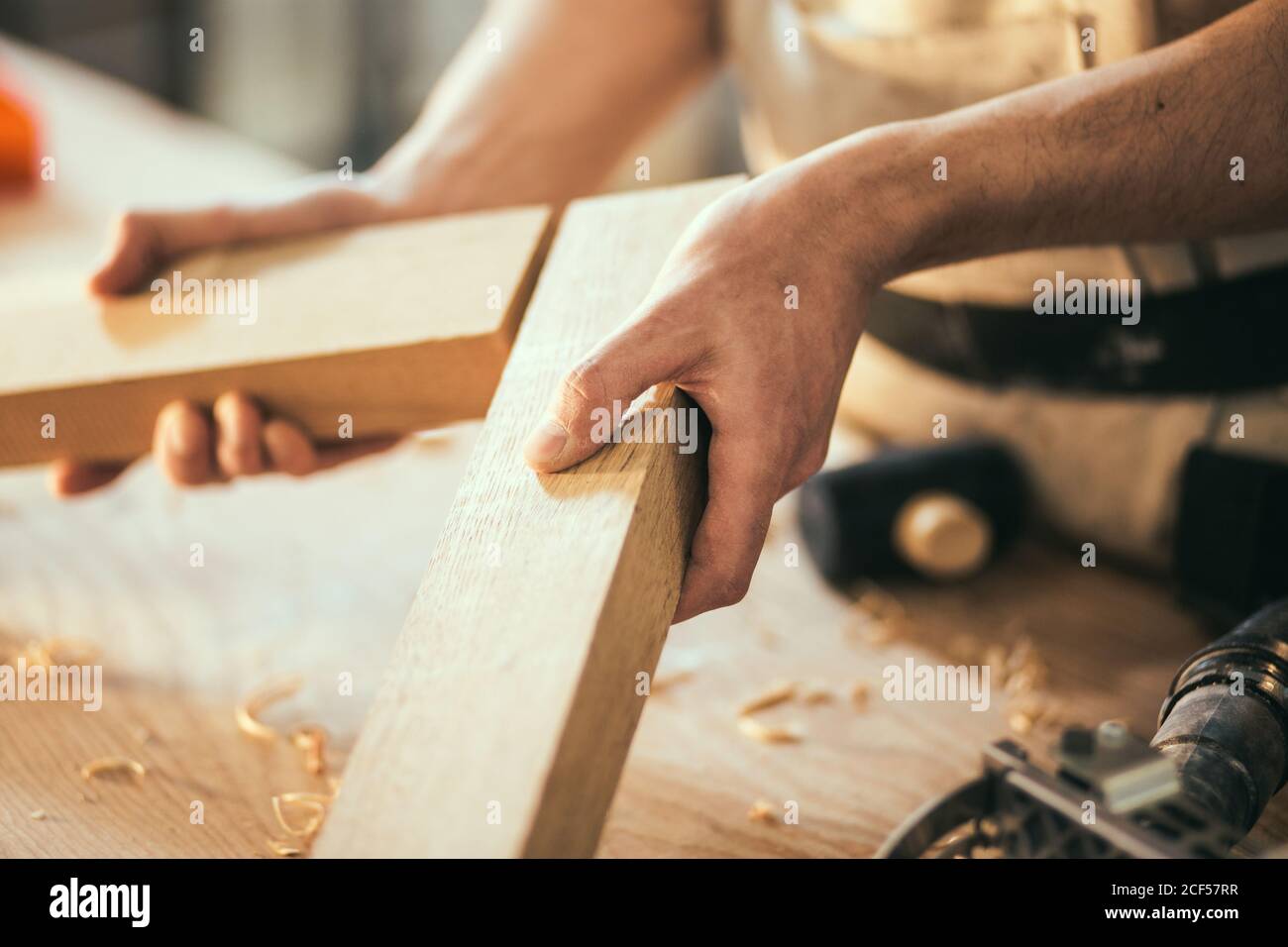 Construction Worker Building Timber Frame In New Home Stock Photo - Alamy