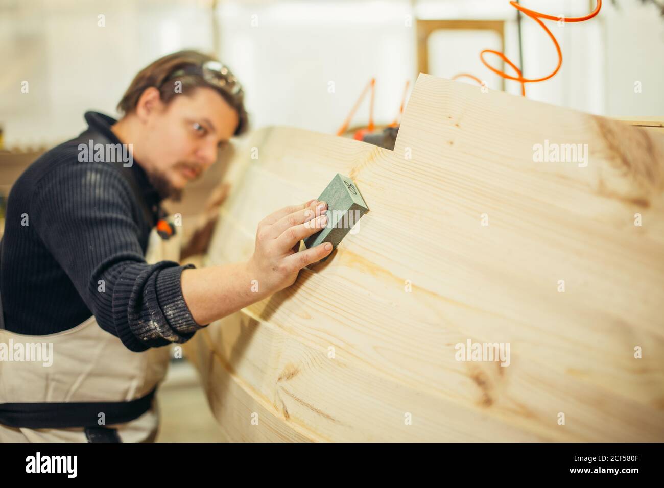 Carpenter manufactures stair treads. Steps to a Wooden Ladder Stock ...