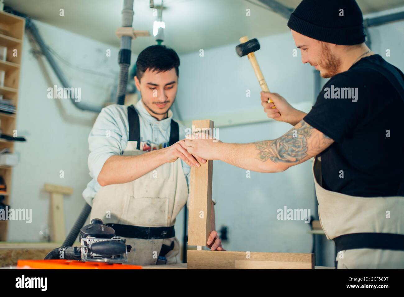 Construction Worker Building Timber Frame In New Home Stock Photo - Alamy