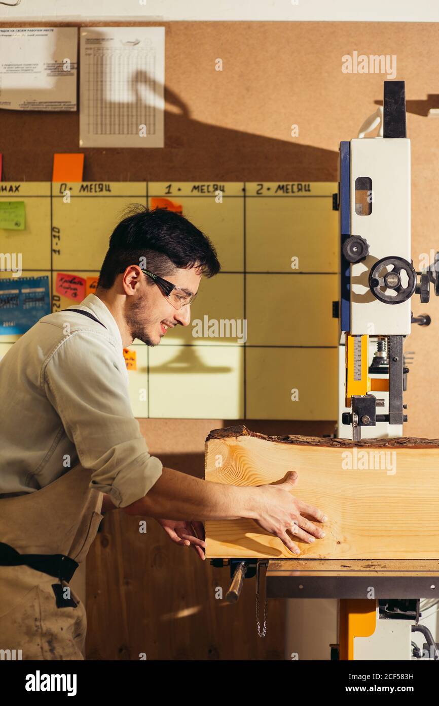 profession, carpentry, woodwork and people concept - carpenter testing ...