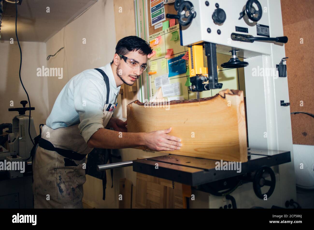 Desk of a carpenter with different tools. Studio shot on a wooden ...
