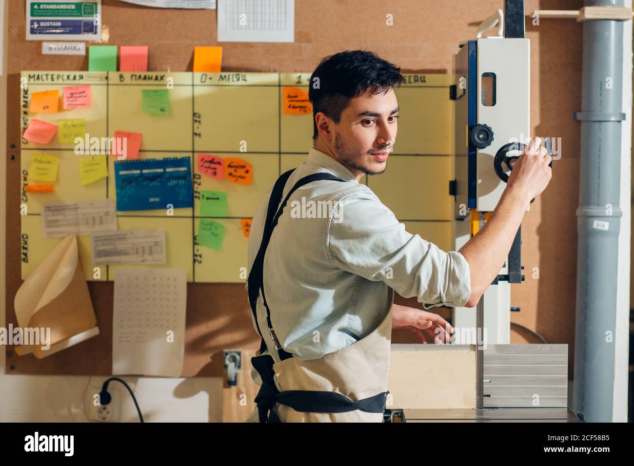 profession, carpentry, woodwork and people concept - carpenter testing ...