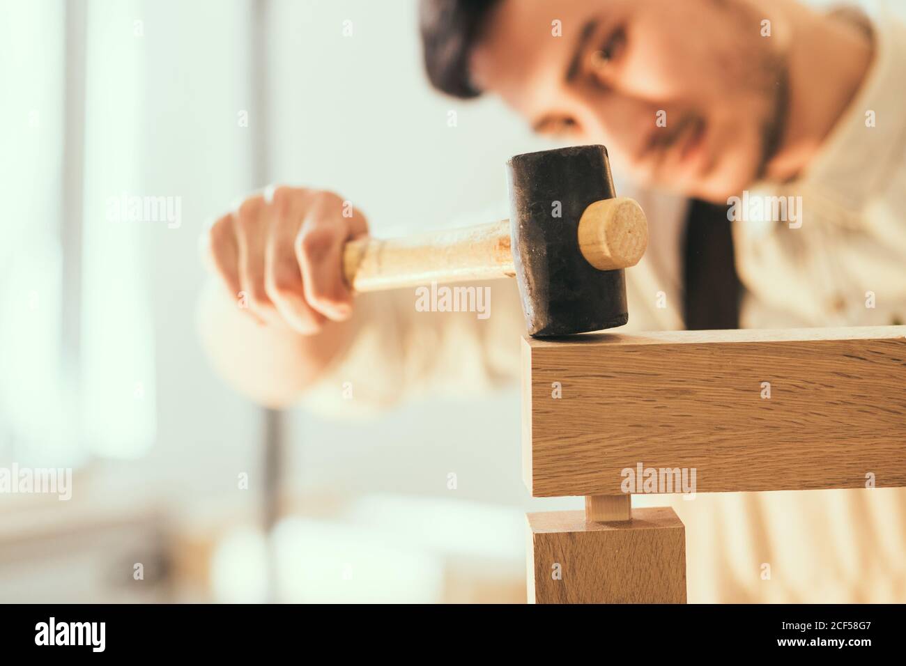 Construction Worker Building Timber Frame In New Home Stock Photo - Alamy