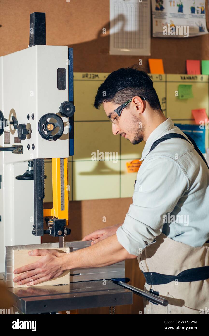 profession, carpentry, woodwork and people concept - carpenter testing ...