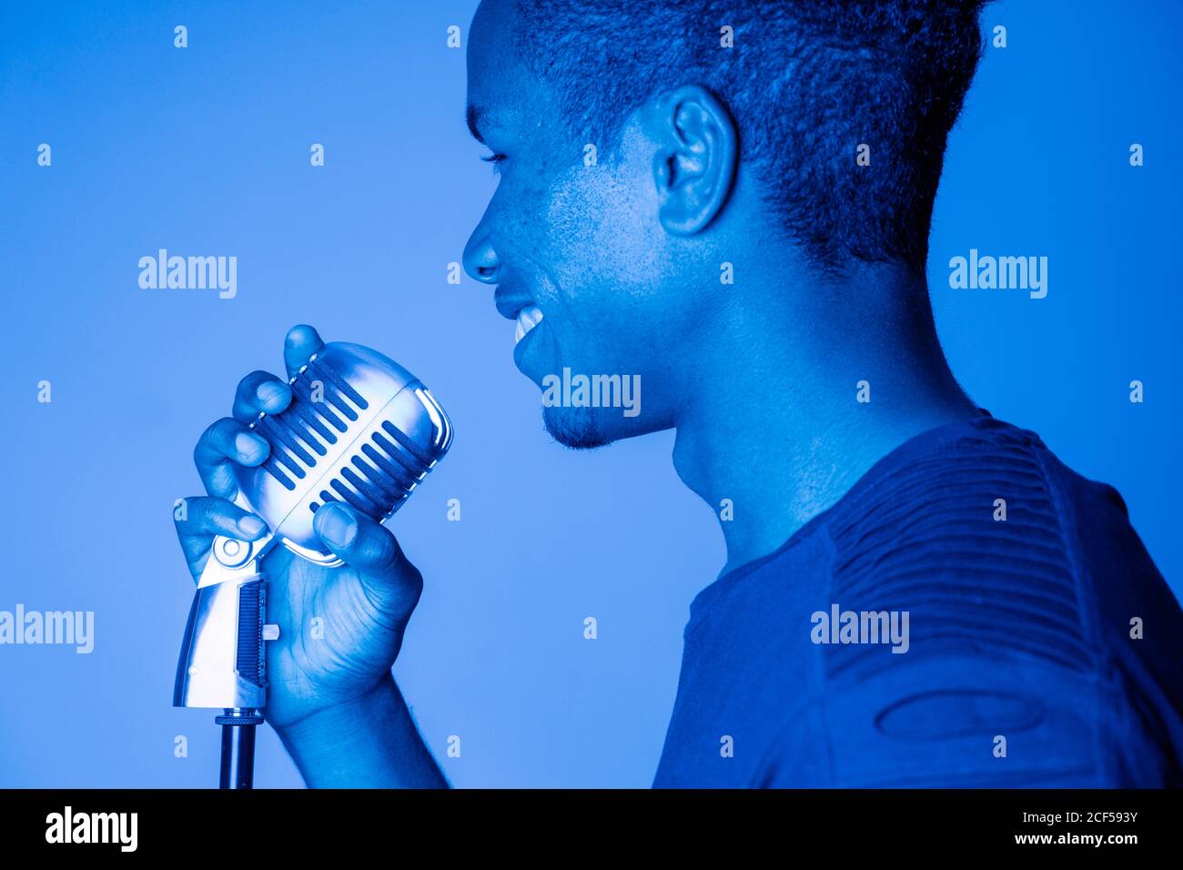 African microphone hi-res stock photography and images - Alamy