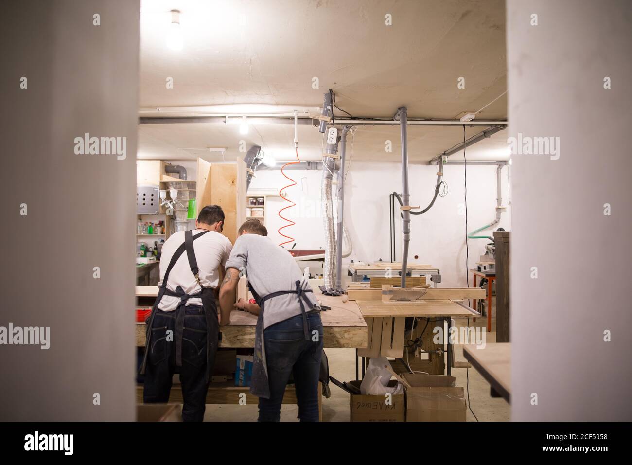 carpenters work. back view Stock Photo - Alamy