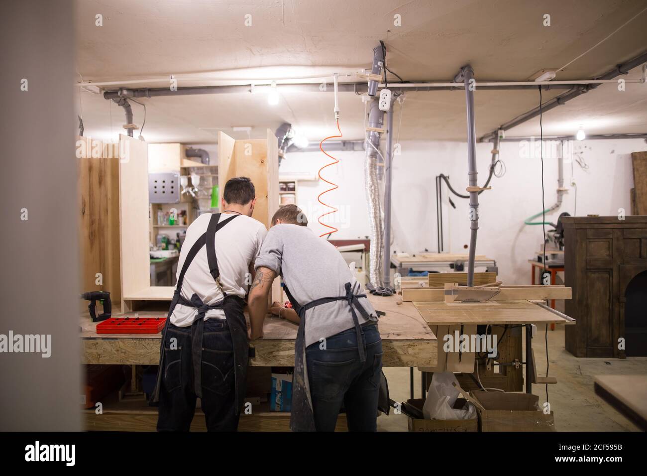 carpenters work. back view Stock Photo - Alamy