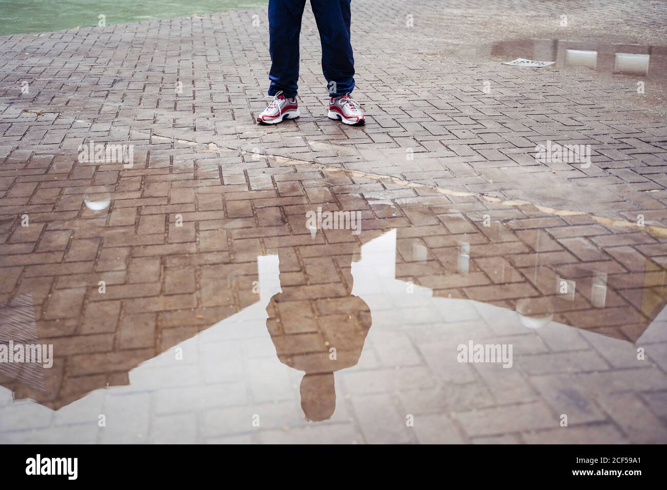 Reflection Puddle Person High Resolution Stock Photography and Images ...