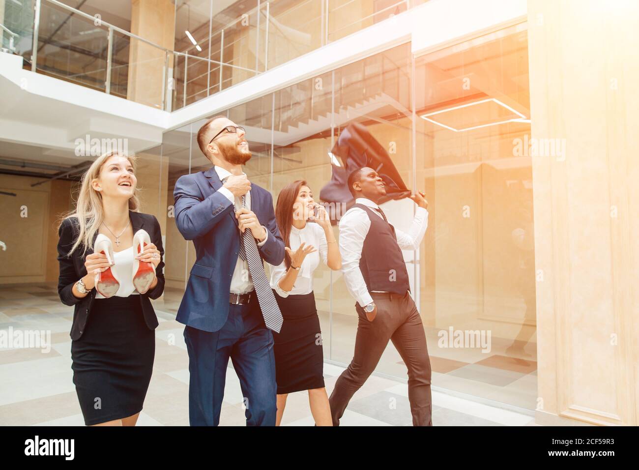 Business team celebrating a triumph with arms up Stock Photo - Alamy