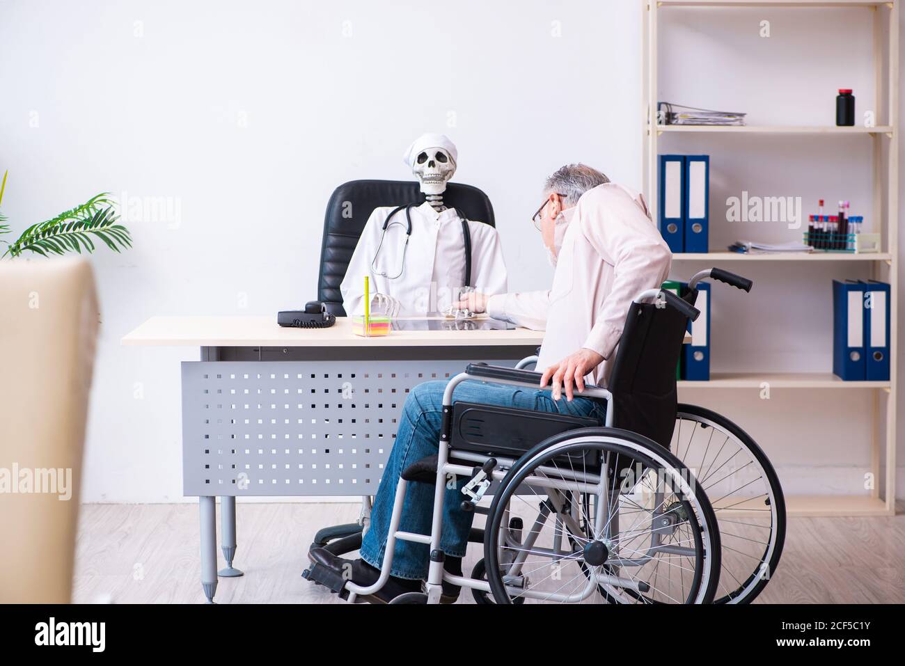Medical skeleton in wheelchair hi-res stock photography and images - Alamy