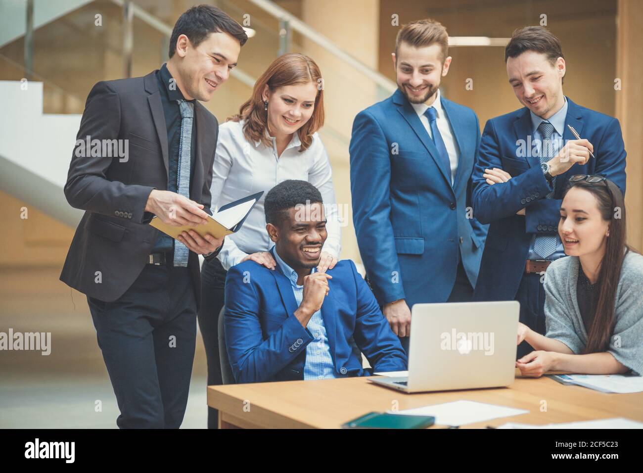Group of Business People Using Digital Devices Stock Photo - Alamy