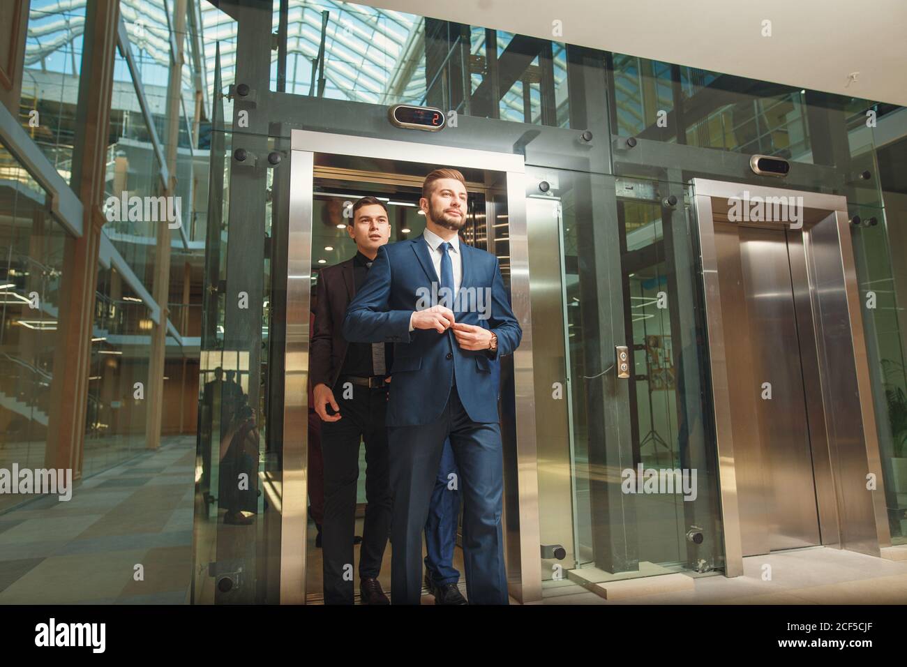 Inside elevator talking hi-res stock photography and images - Alamy