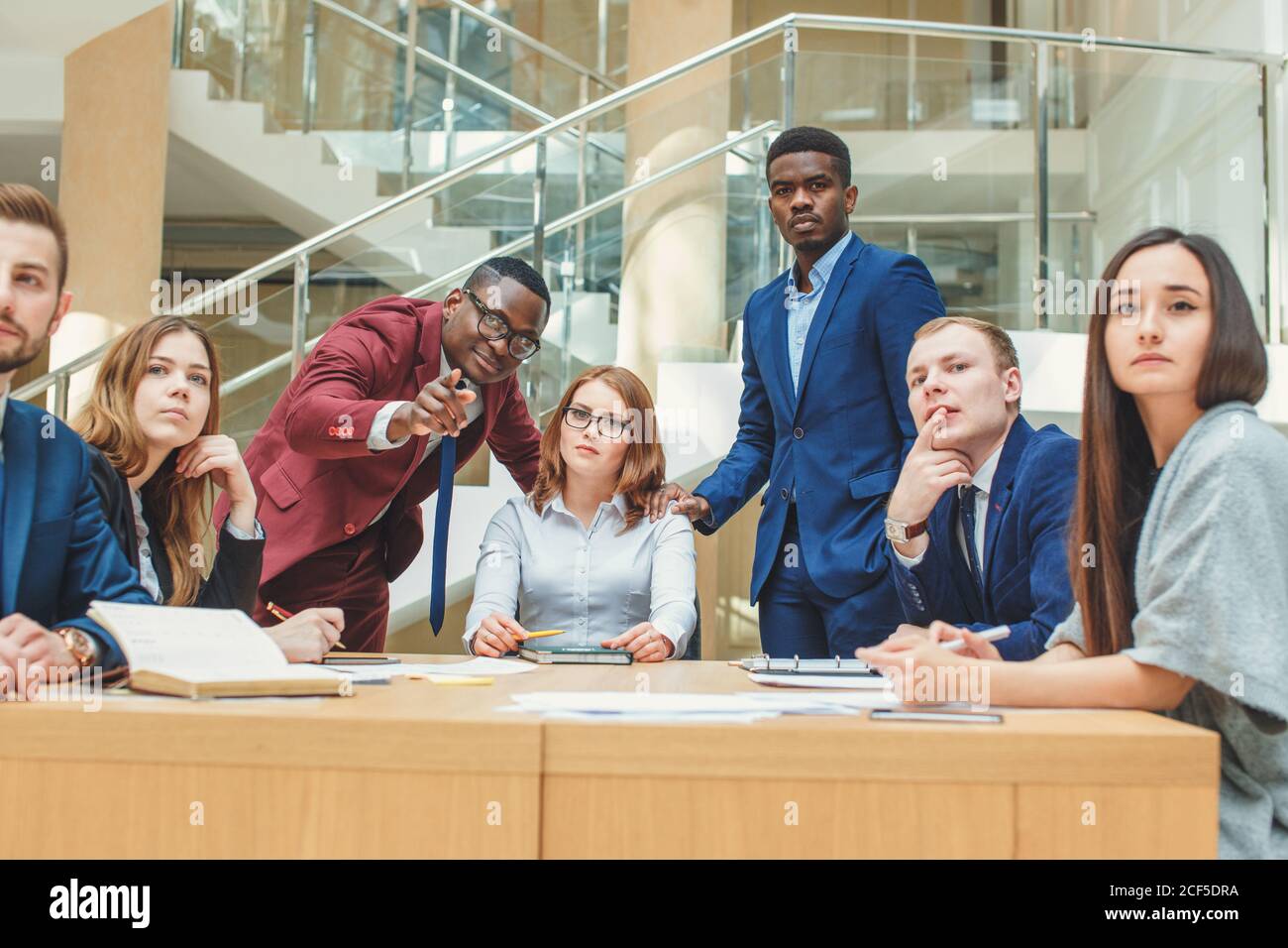 Female Boss Addressing Office Workers At Meeting Stock Photo - Alamy