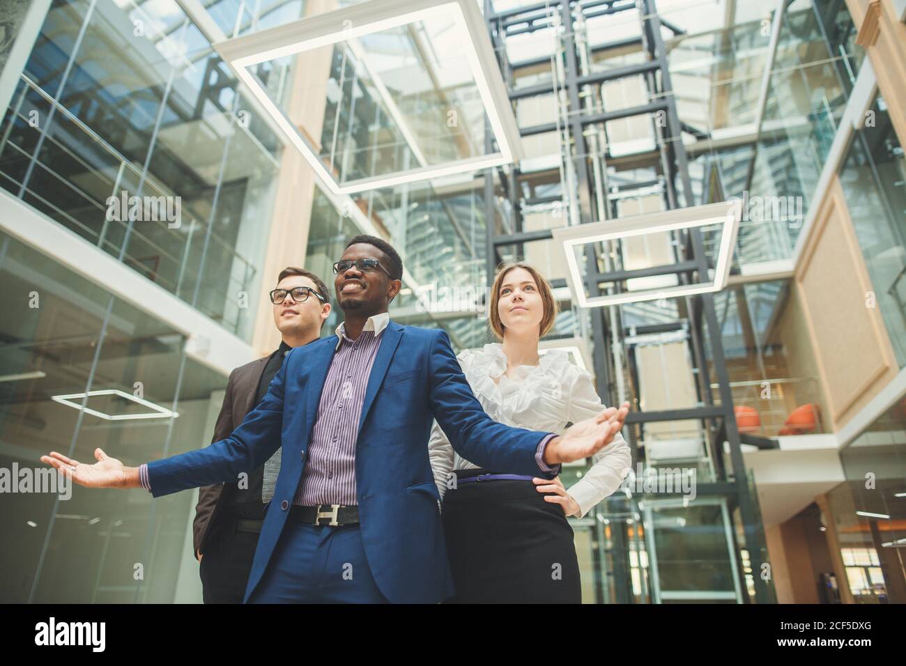 Young African American Business Man leading a team Stock Photo - Alamy