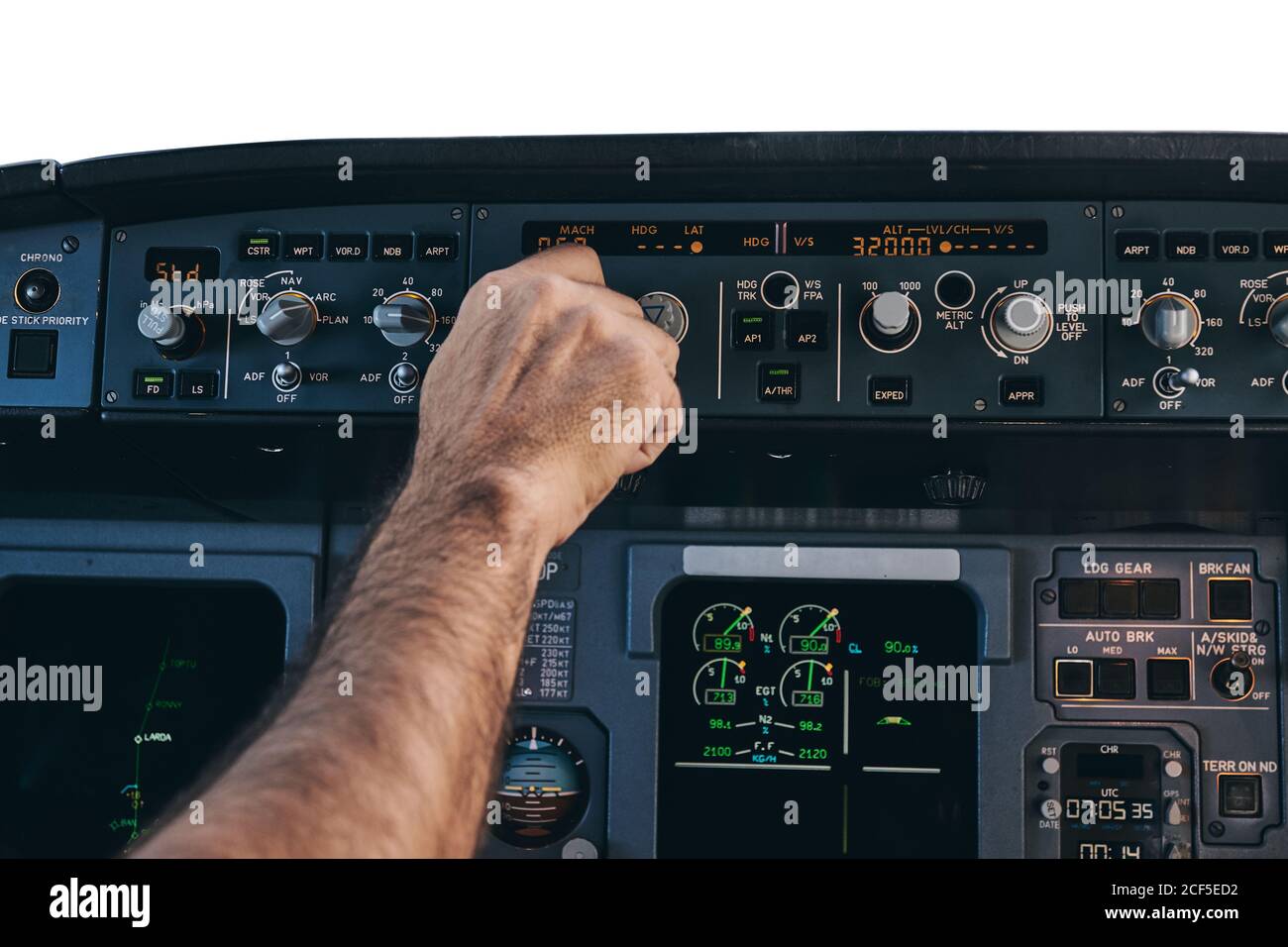 Pilot using flight management system during flight Stock Photo - Alamy