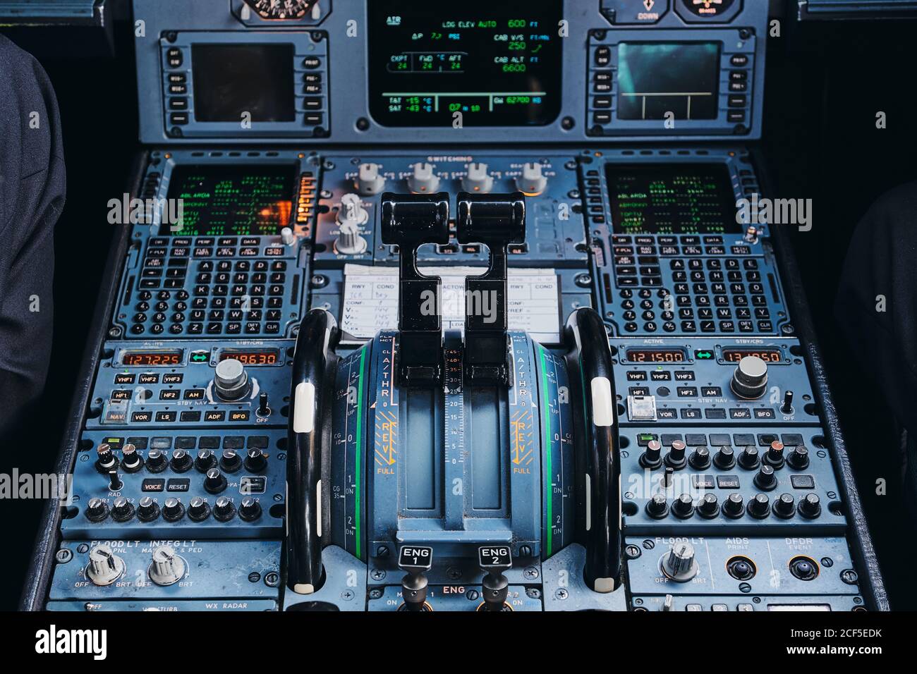 From above of engine power control levers and switches on instrument ...