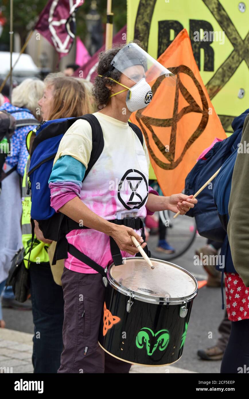 Extinction rebellion face mask hi-res stock photography and images - Alamy