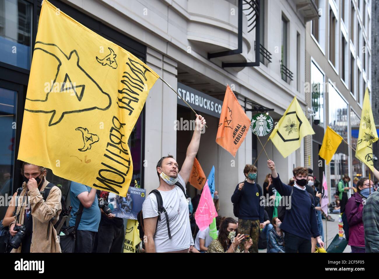 Protesters block street waving hi-res stock photography and images - Alamy