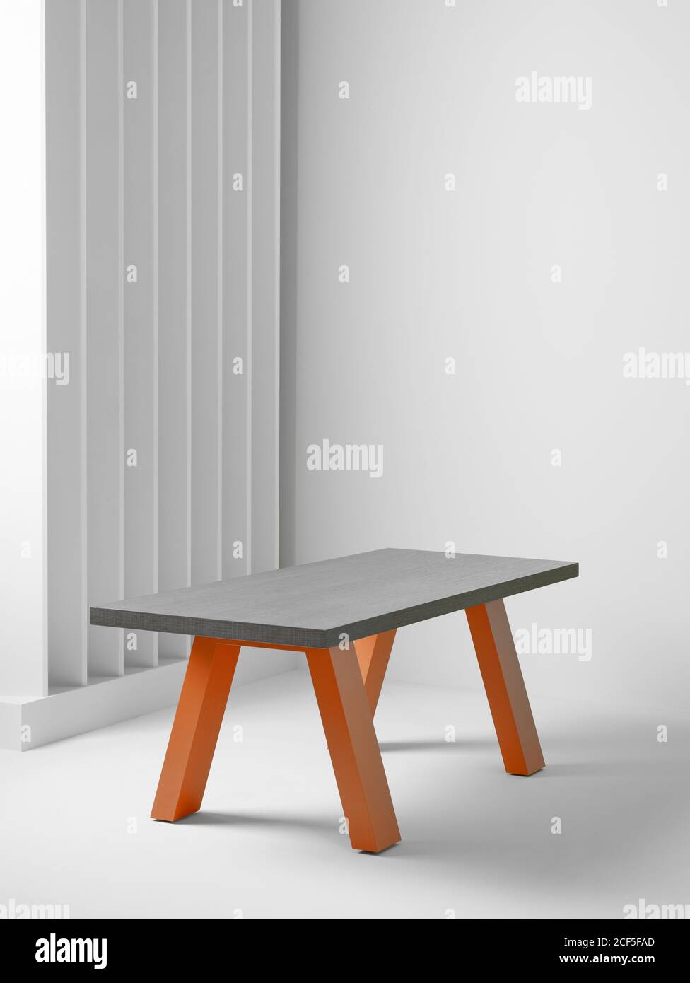 Small trendy table located in middle of modern simple room with white ...