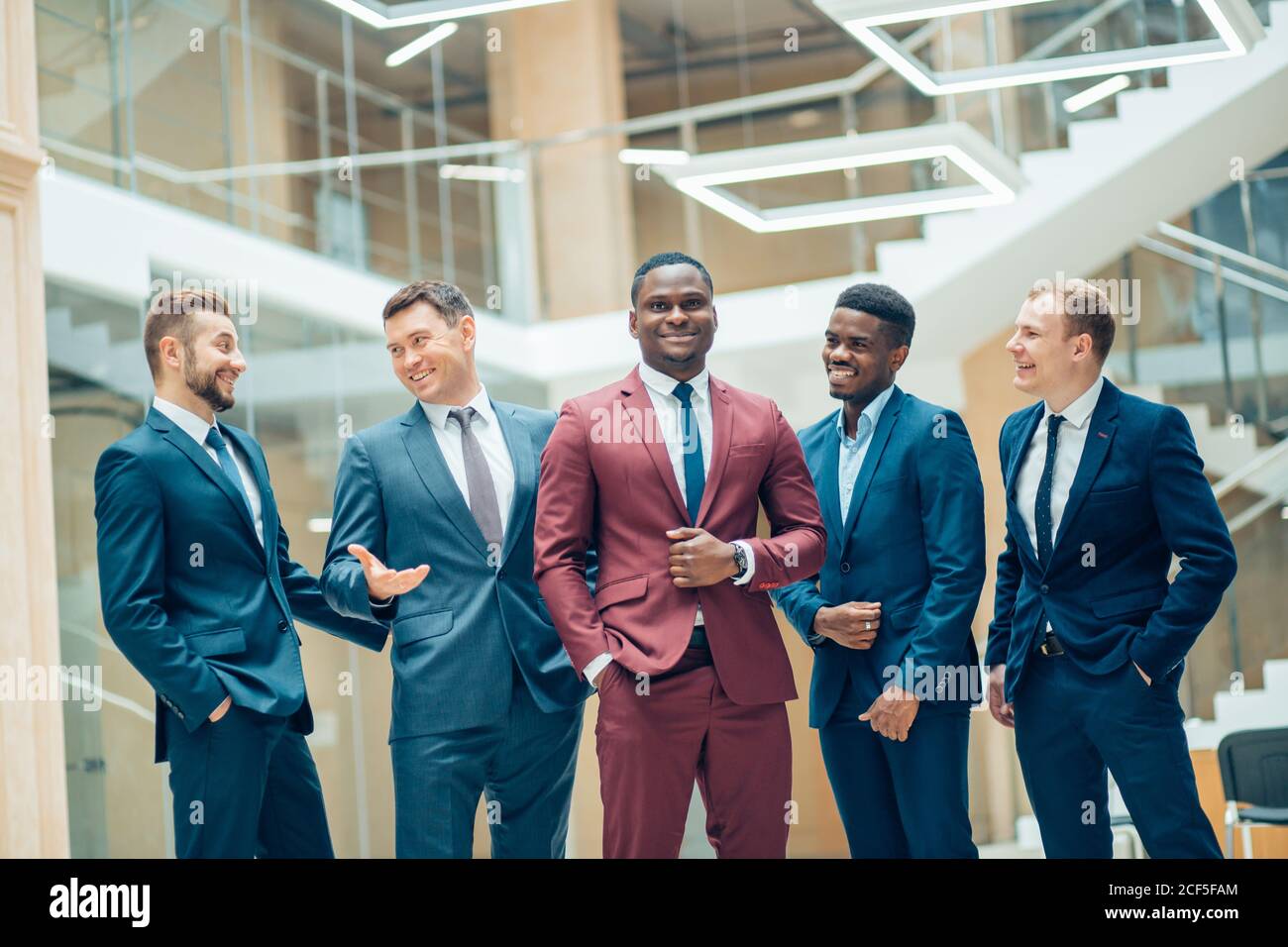 Portrait Of Multi-Cultural Office Staff Standing In Lobby Stock Photo ...