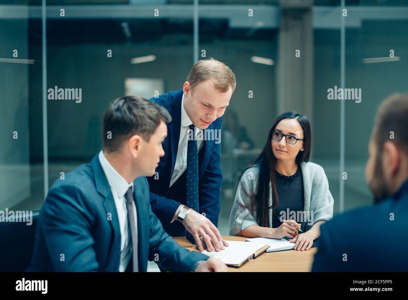 Young boss making great business discussion in modern coworking office ...