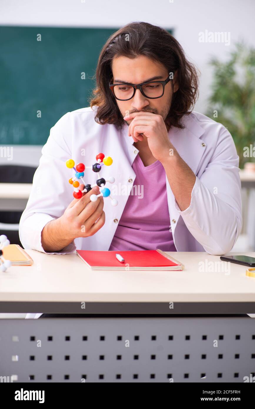 Young physicist in the classroom Stock Photo - Alamy
