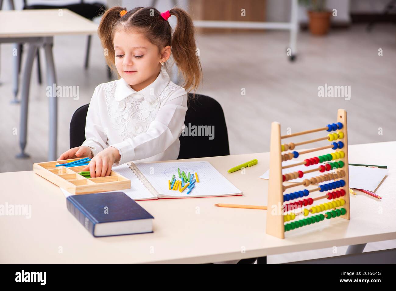 Small girl in the early development concept Stock Photo - Alamy