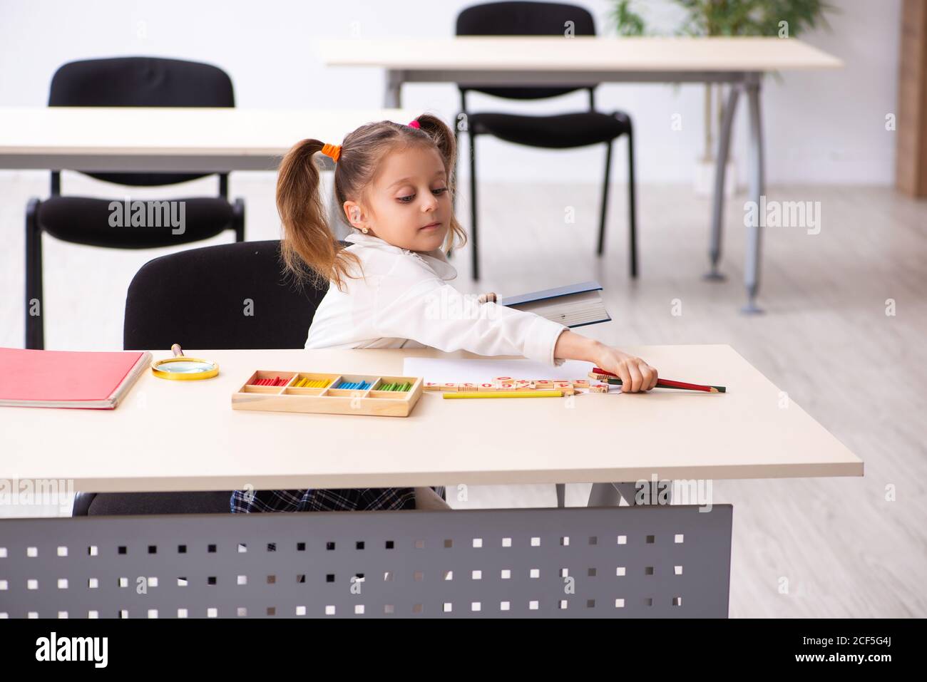 Small girl in the early development concept Stock Photo - Alamy