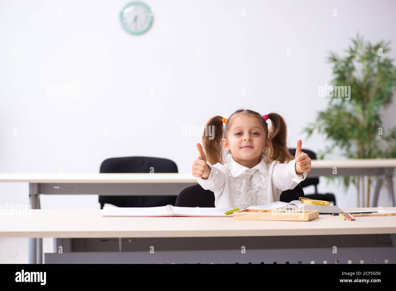 Small girl in the early development concept Stock Photo - Alamy