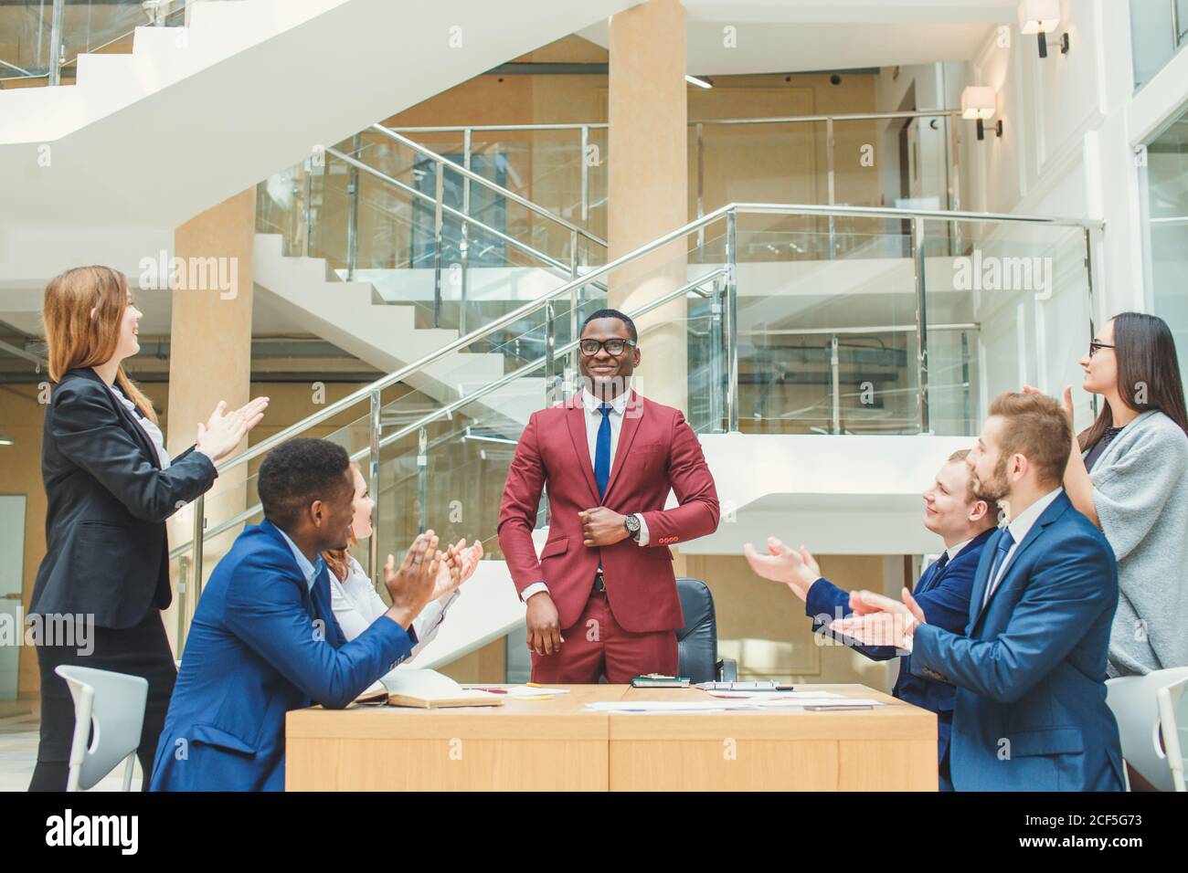 Smiling multicultural business partners hi-res stock photography and ...