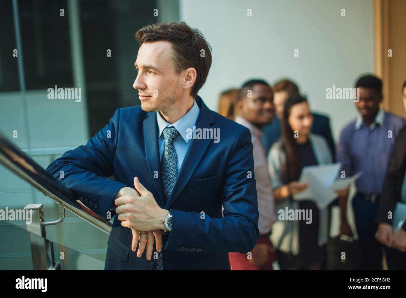 Portrait of a handsome CEO businessman smiling Stock Photo - Alamy